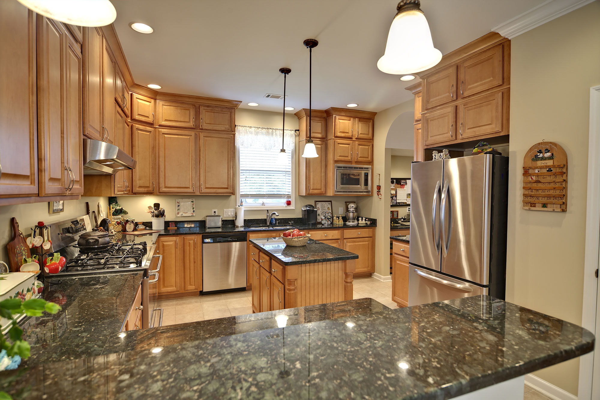 Modern-kitchen-with-granite-counters - Buliding Industry Synergy Inc